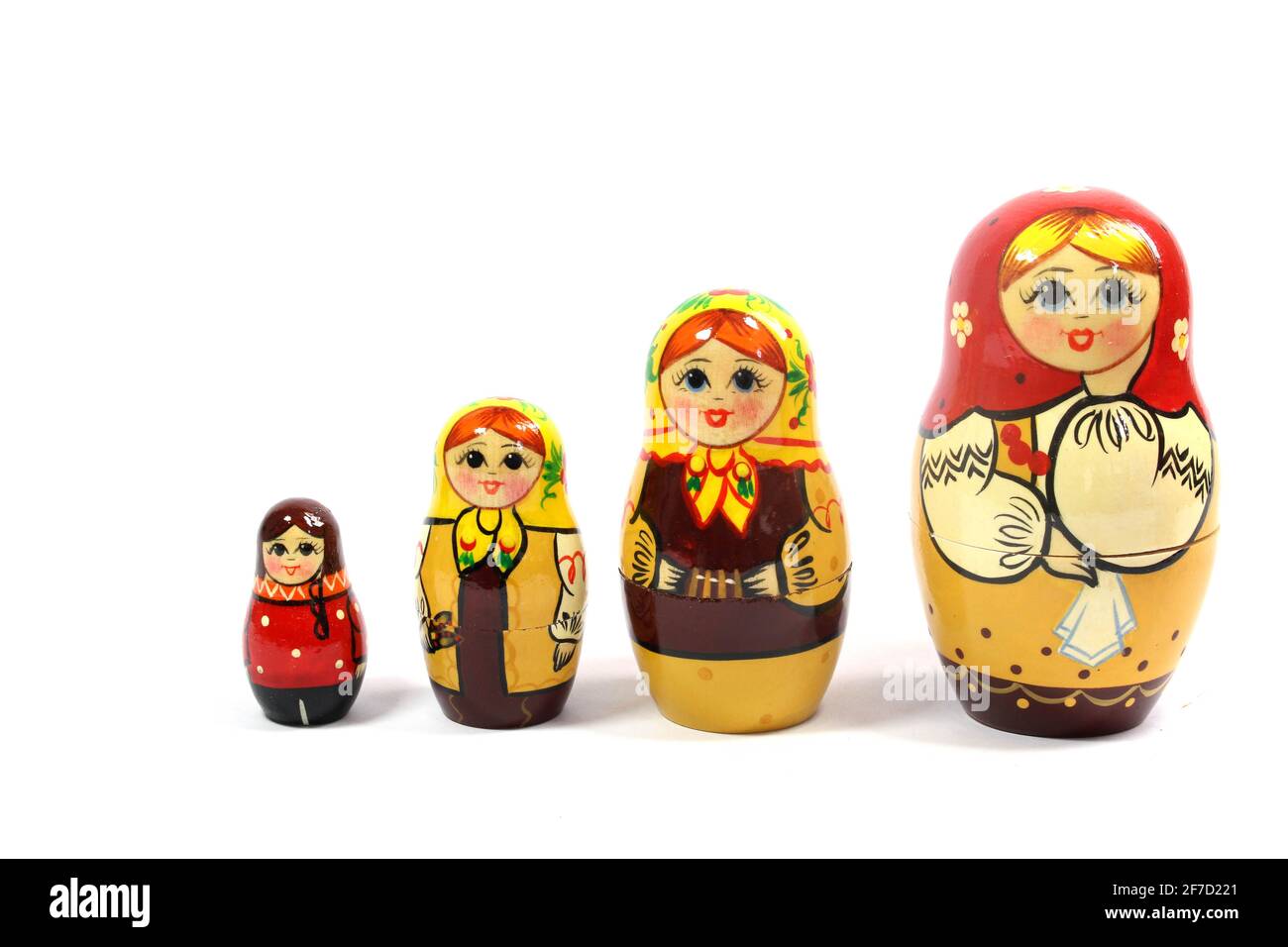A Collection of Wooden Nesting Stacking Dolls on White Background Stock ...
