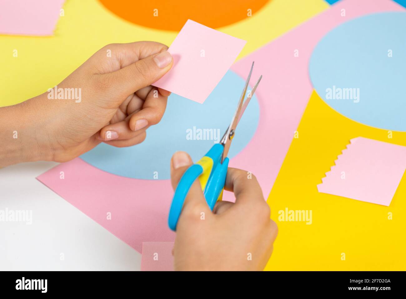 Cutting paper scissors teen hi-res stock photography and images - Alamy