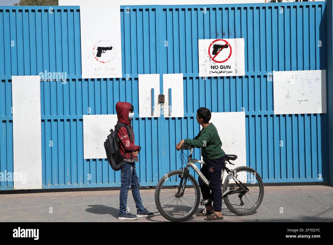 Gaza City. 6th Apr, 2021. Palestinian children talk in front of a ...