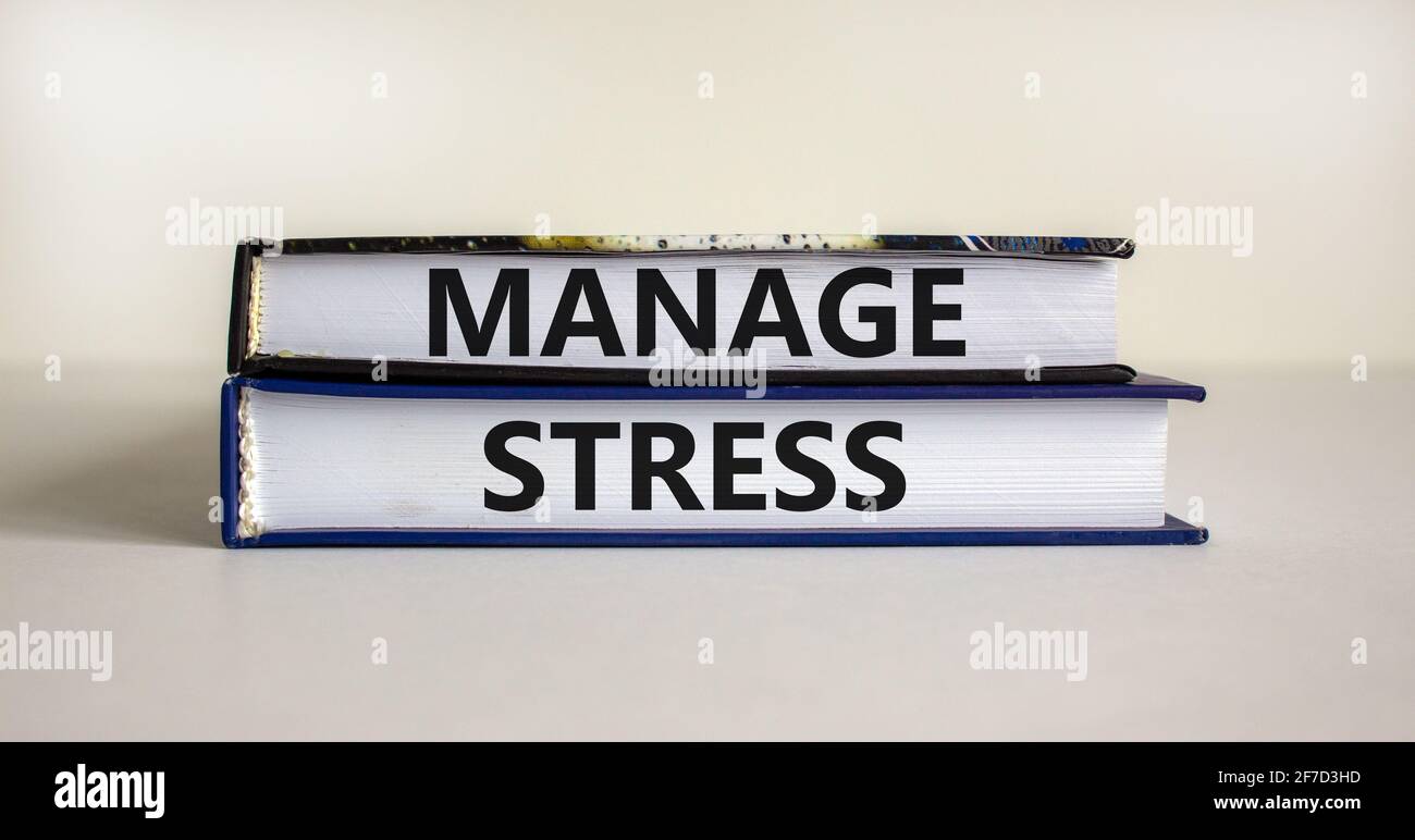 Manage stress and be health symbol. Books with words 'manage stress ...