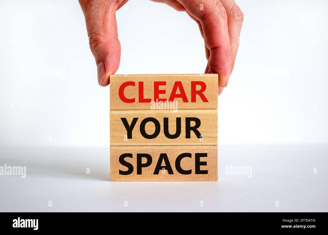 Clear your space symbol. Wooden blocks with words 'Clear your space ...