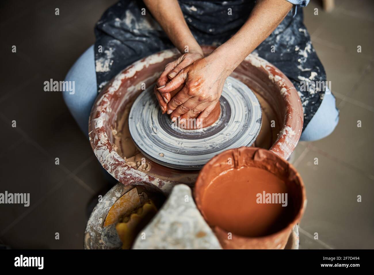 Old woman hands making pottery in workshop Stock Photo - Alamy