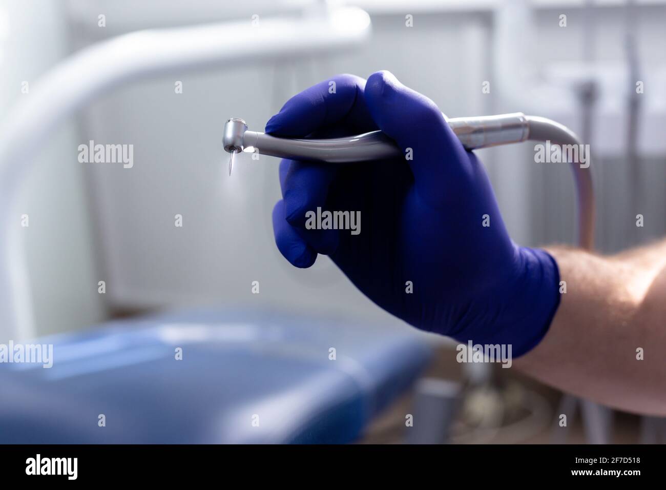 Drill in hand at the dentist. Dental equipment Stock Photo - Alamy