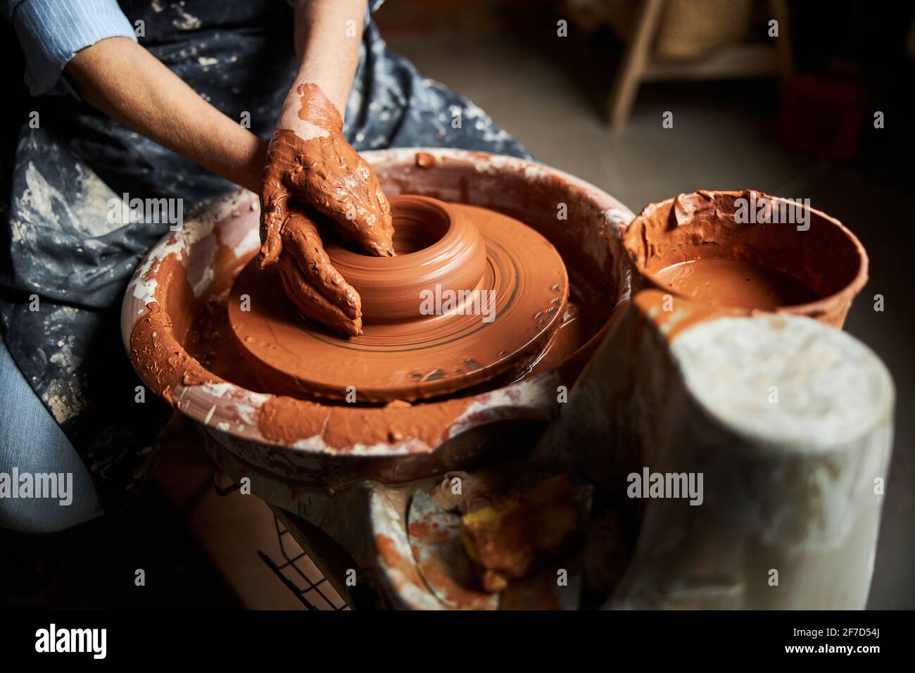 Woman making clay pot hi-res stock photography and images - Alamy