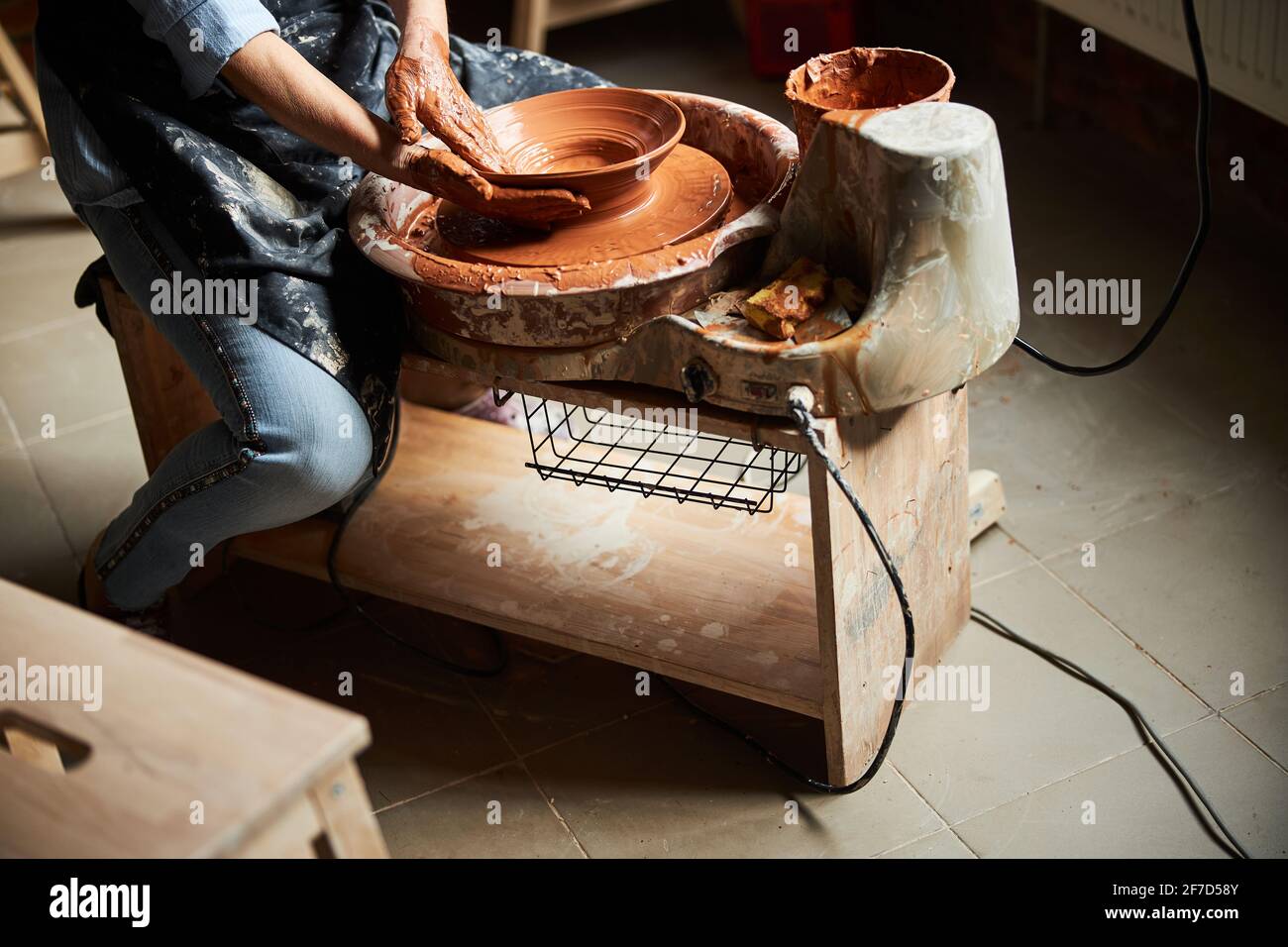 Woman making clay pot hi-res stock photography and images - Alamy