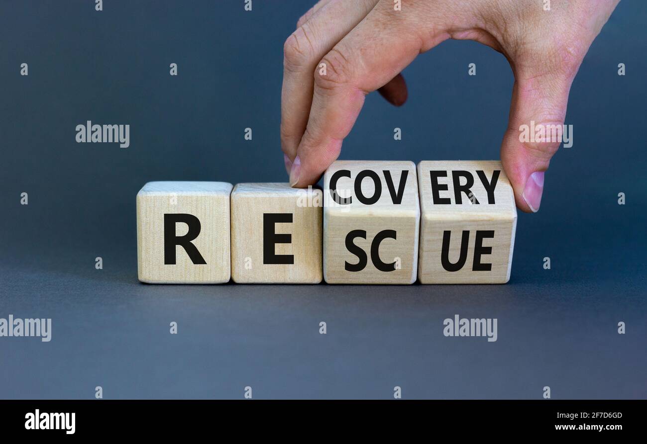 Recovery and rescue symbol. Businessman turns cubes and changes the ...