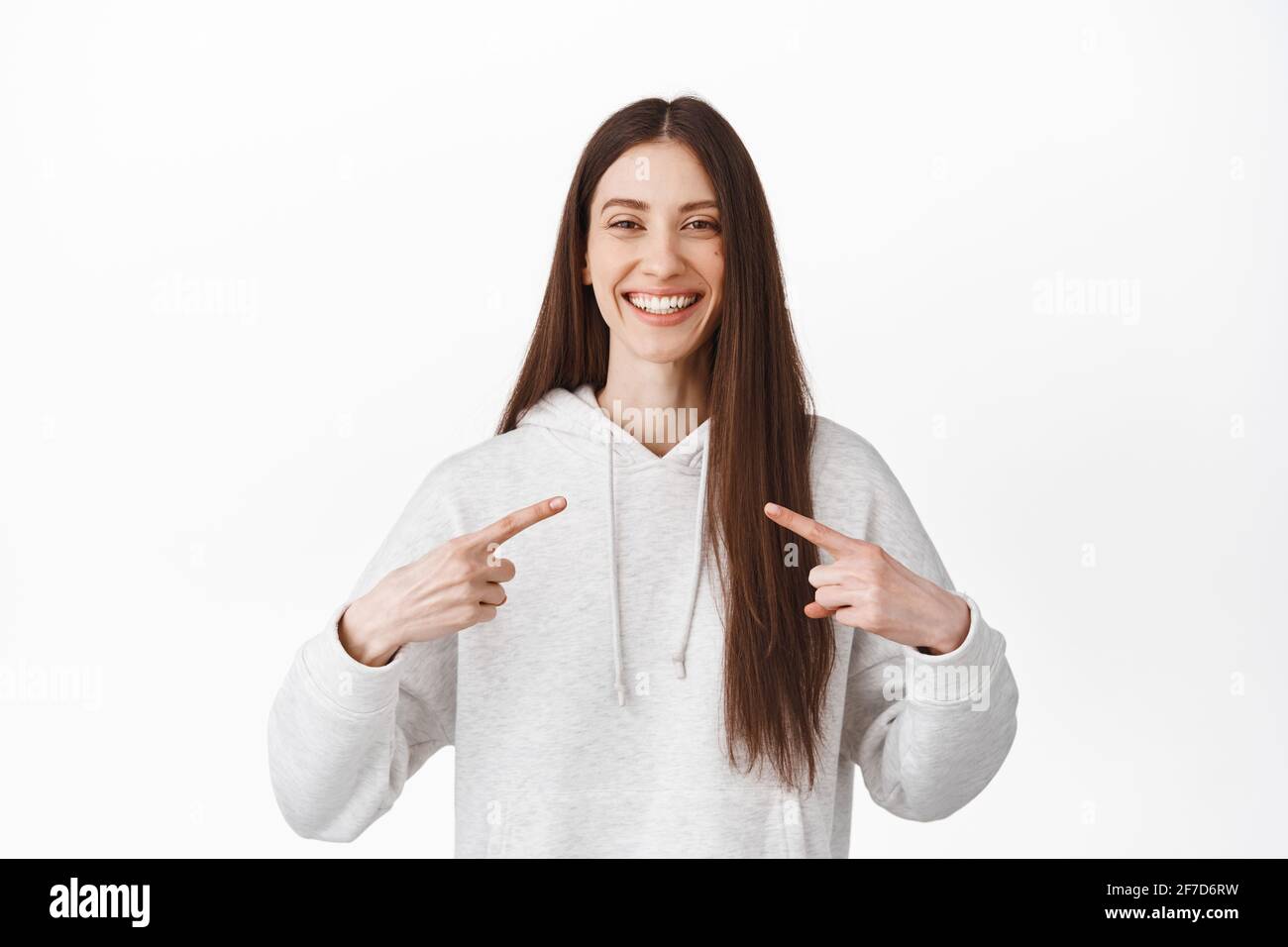 Woman points teeth hi-res stock photography and images - Alamy