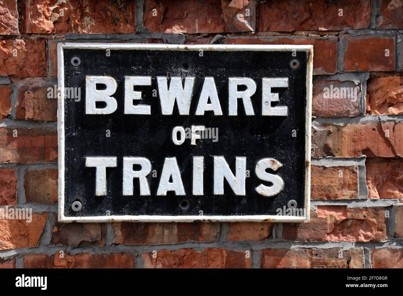 Beware of Trains sign at Nantwich in Cheshire Stock Photo - Alamy