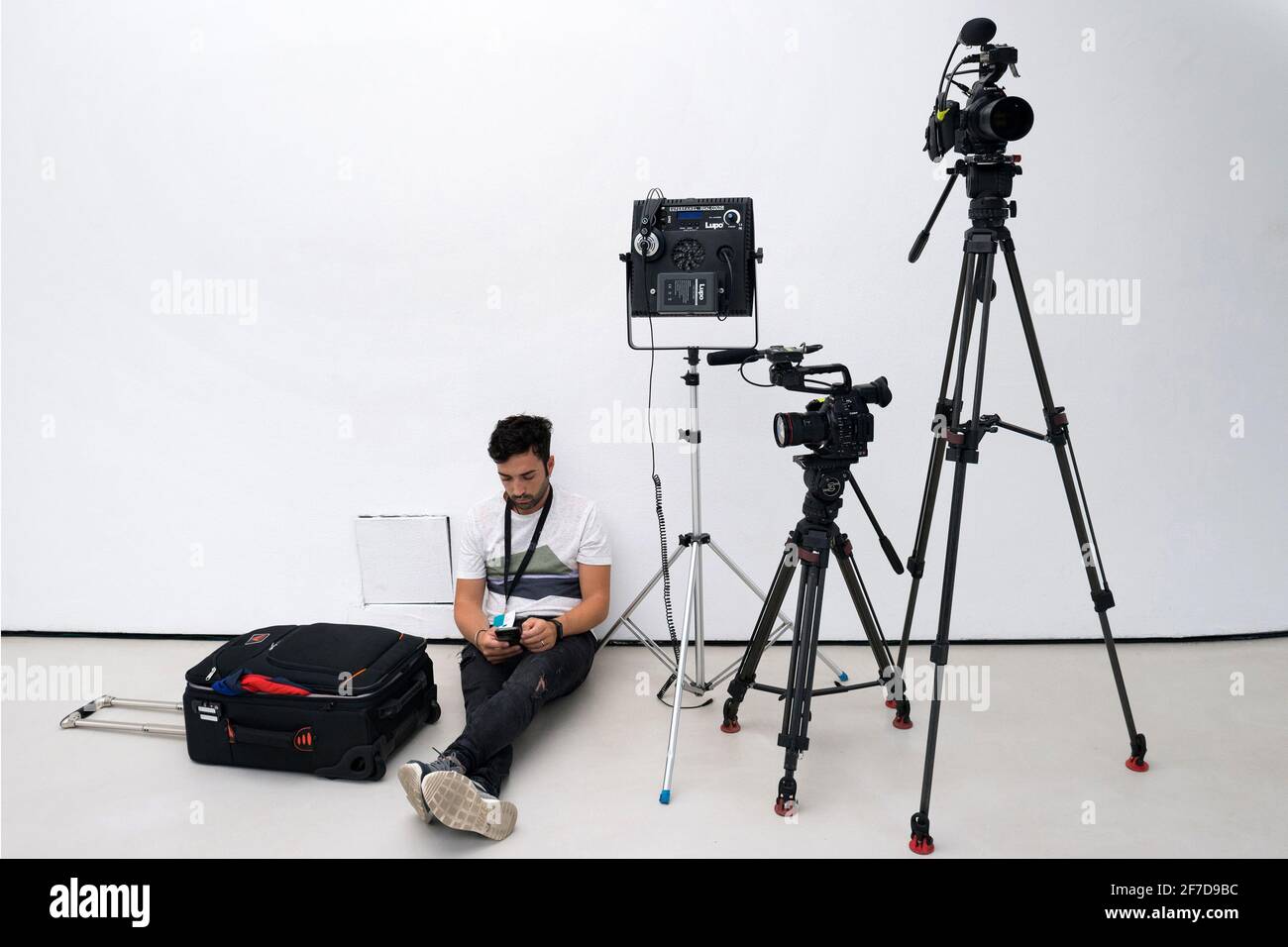 Rome, Lazio region, Italy: A young operator waiting before an interview ...