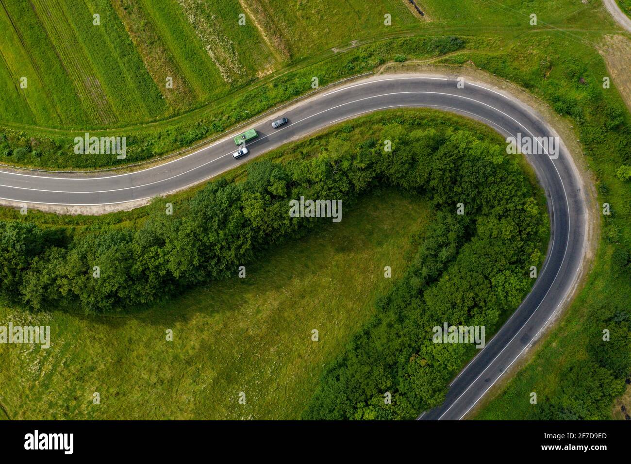 Winding road and dangerous turns, serpentine roads from a bird's eye ...