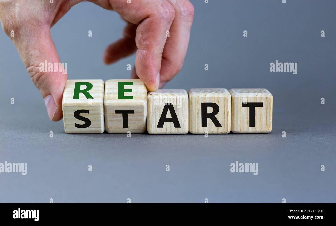 Restart symbol. Concept word 'restart' on wooden cubes on a beautiful ...