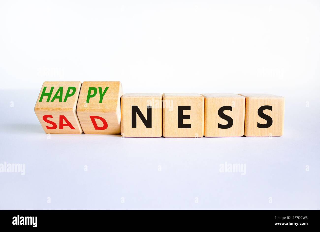 Happyness or sadness symbol. Turned cubes and changed the word 'sadness ...