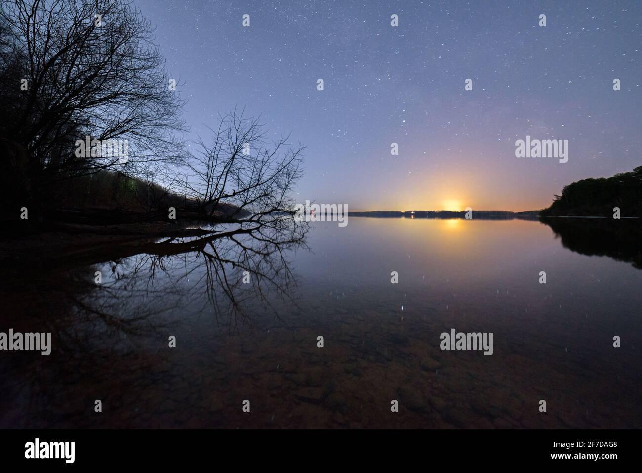 Amazing night starry sky, reflection in the water Stock Photo - Alamy