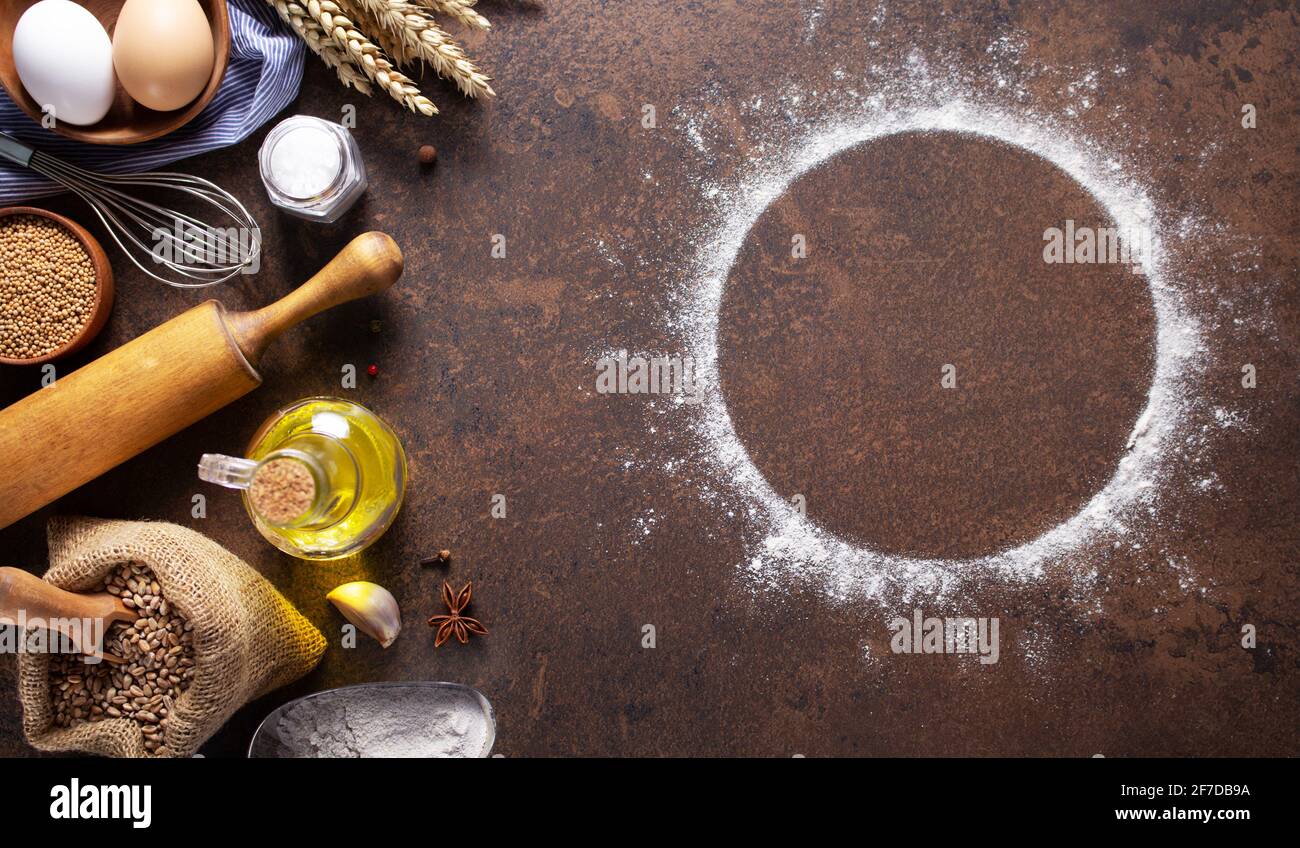Bakery ingredients for homemade bread baking on table. Flour food round ...