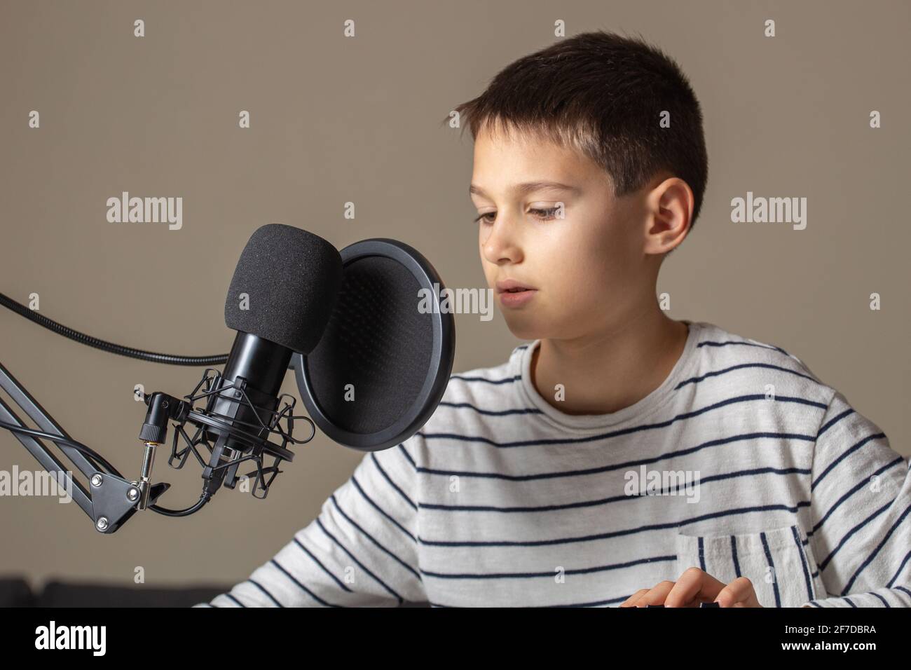 Teen boy microphone school hi-res stock photography and images - Alamy