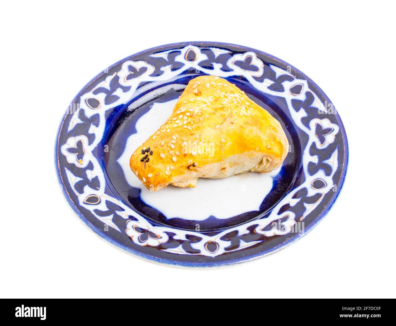 Traditional uzbek samsa bun with minced lamb. Served on authentic ...
