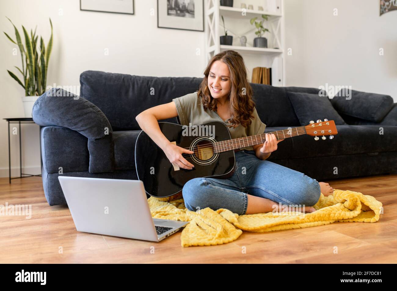 Young musician enjoys music hi-res stock photography and images - Alamy