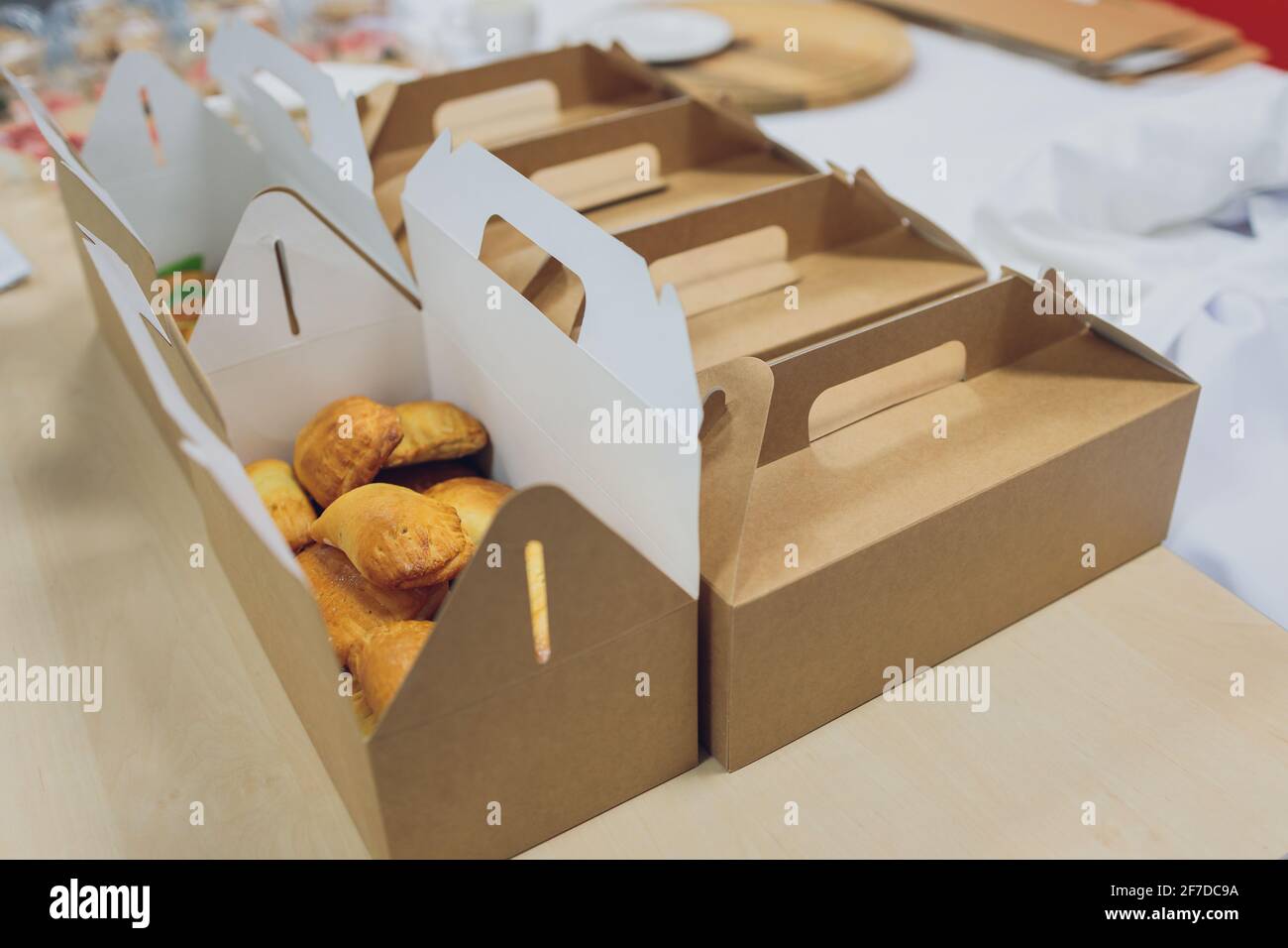 Many various take-out food containers, pizza box, coffee cups and paper ...