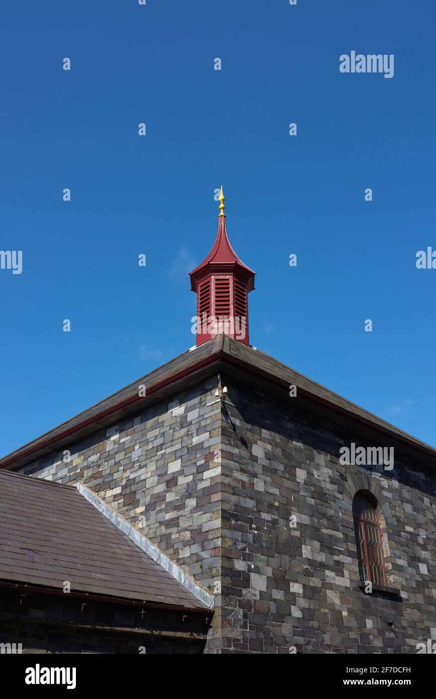 Slate building with Slate wall and slate roof and clear blue sky and no ...