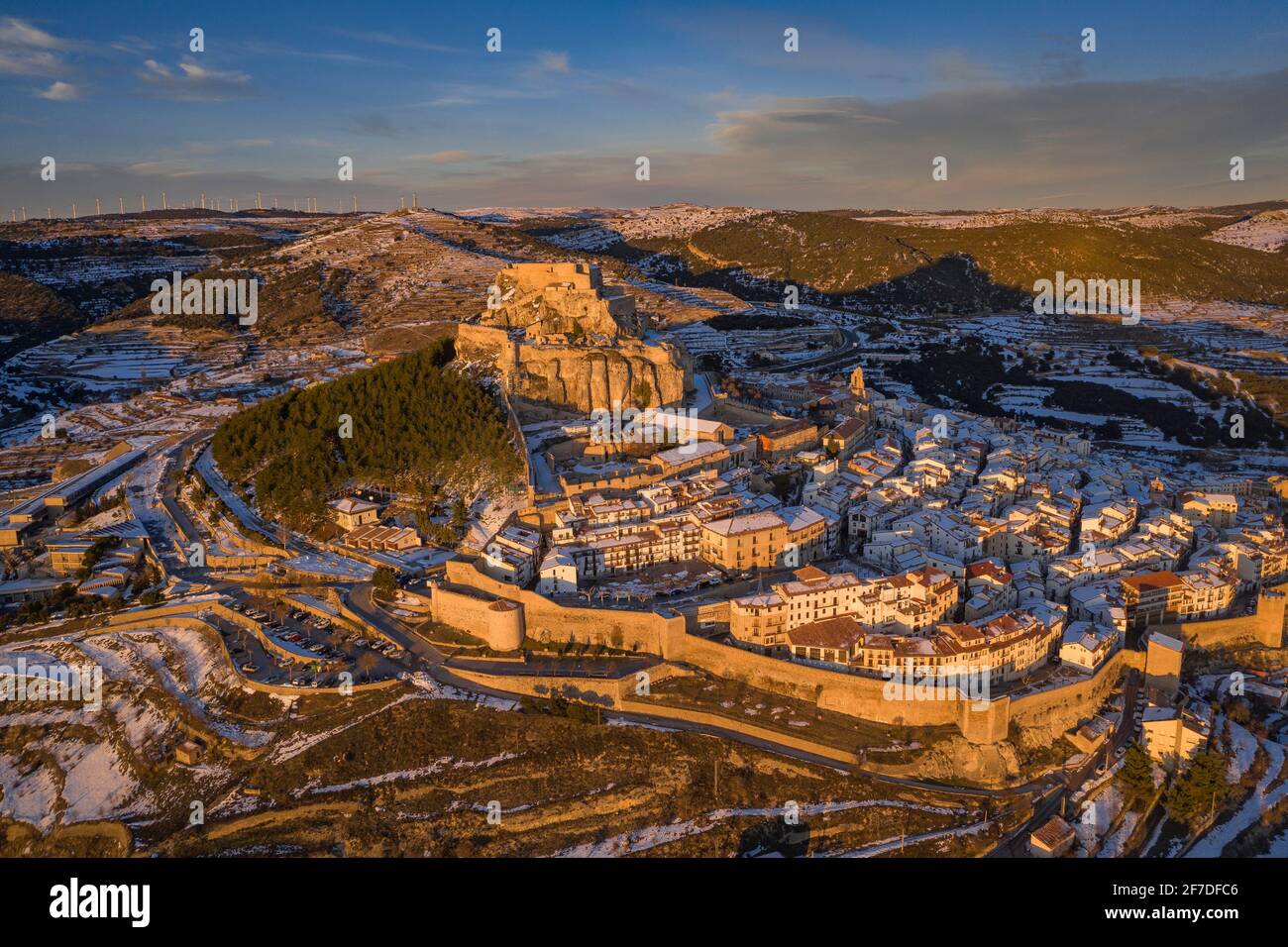 Morella medieval city aerial view, in a winter sunset, after a snowfall ...