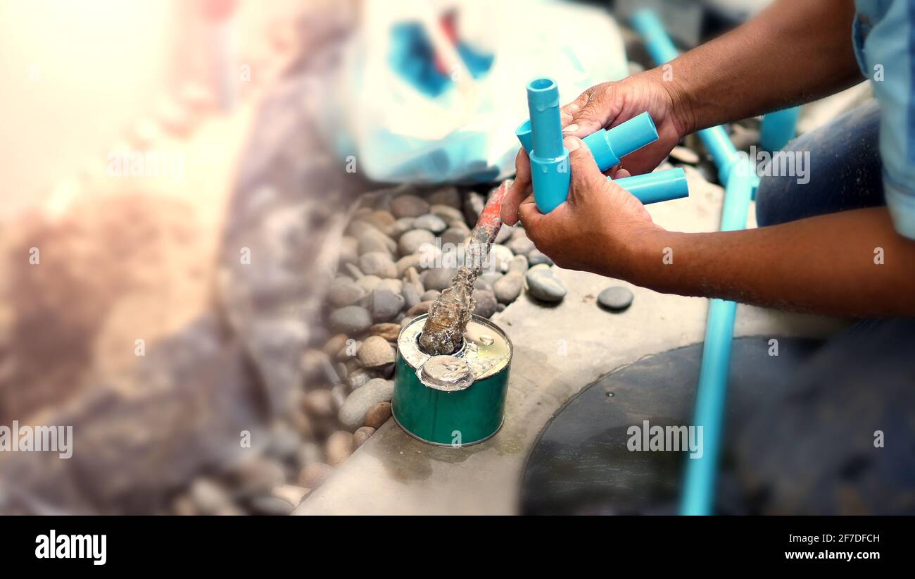 Fixing water pipe at home outdoor which broken or damage. Cause of ...