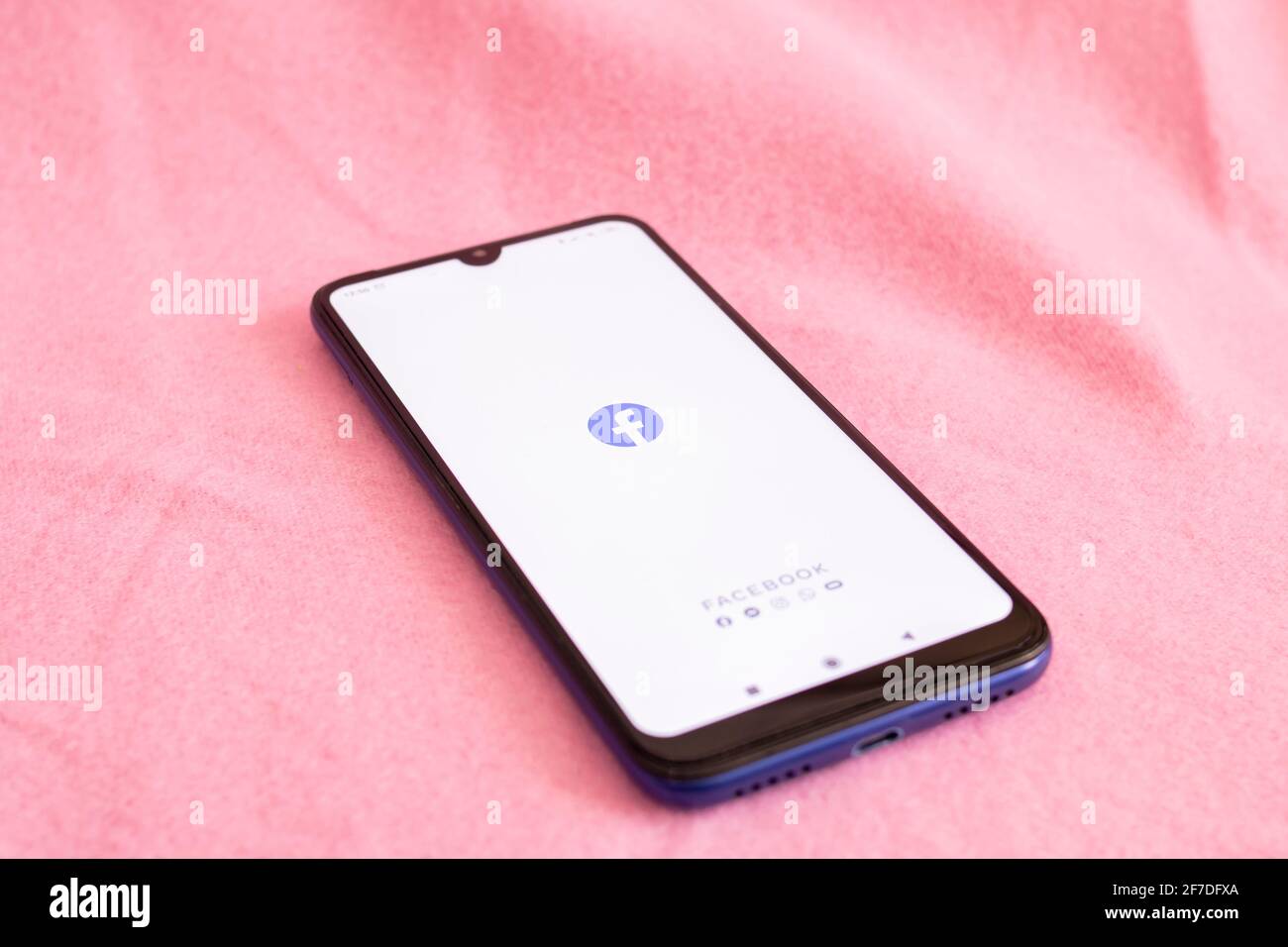 NOVOPOLOTSK, BELARUS - 06 FEBRUARY, 2021: Phone and facebook logo on ...