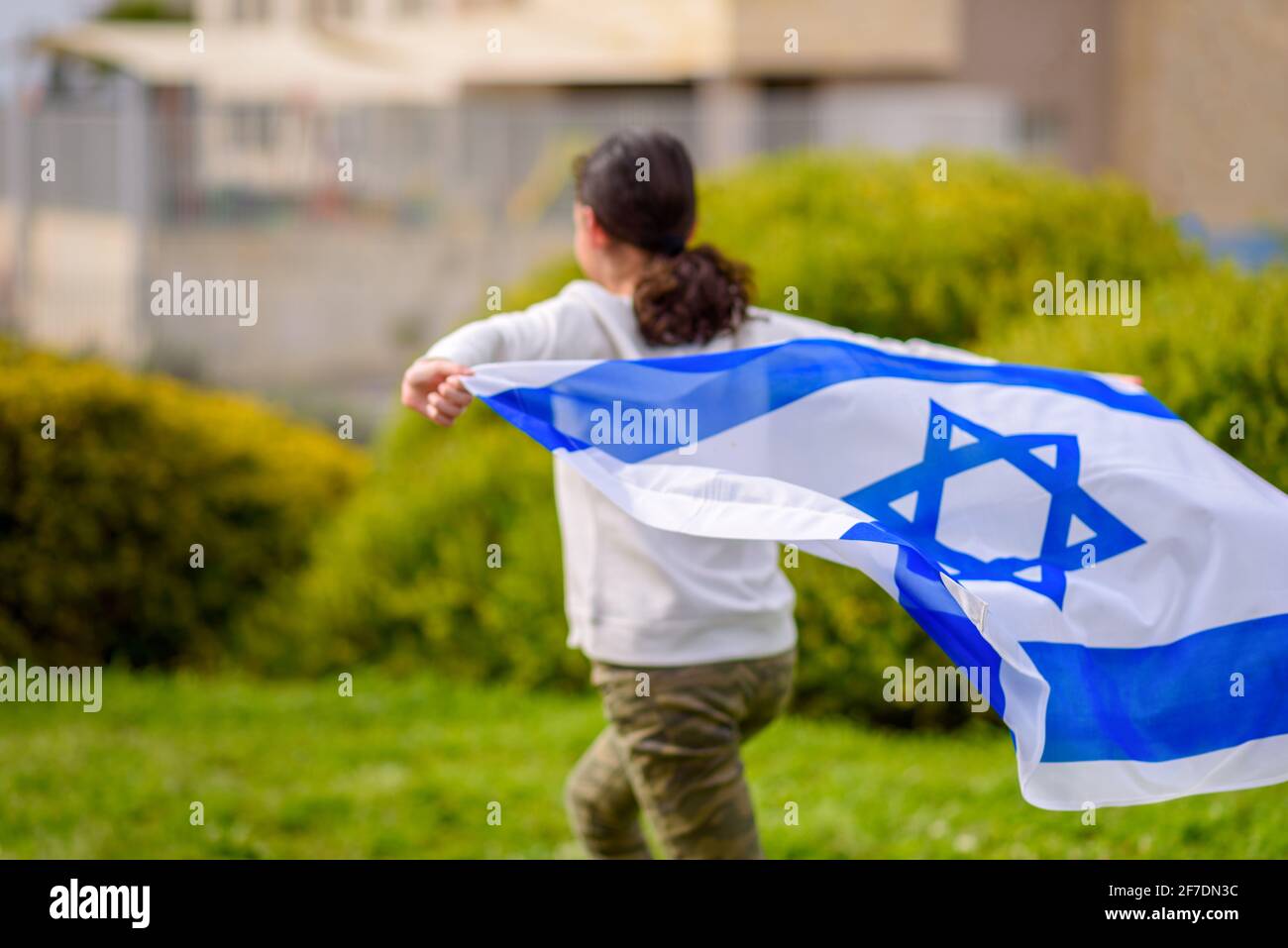 Happy Girl running with Israel flag. Image to illustrate election win ...