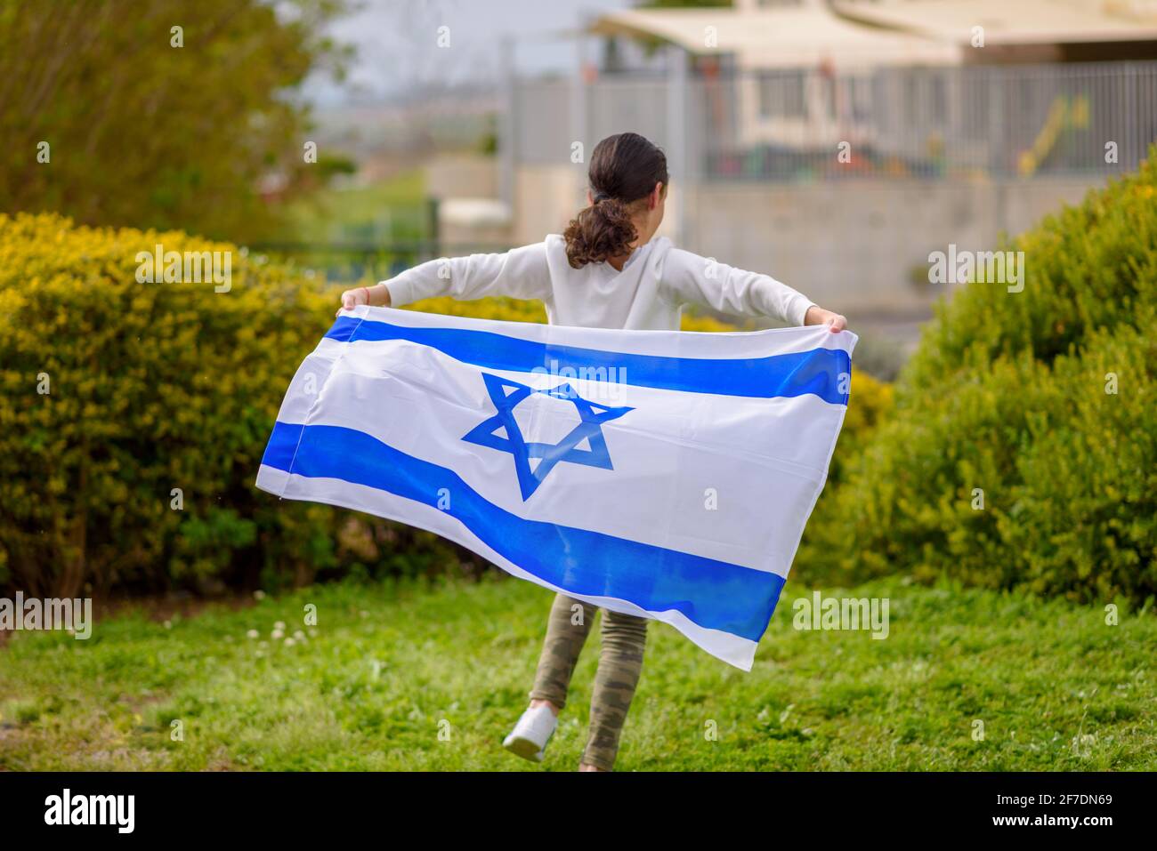 Happy Girl running with Israel flag. Image to illustrate election win ...