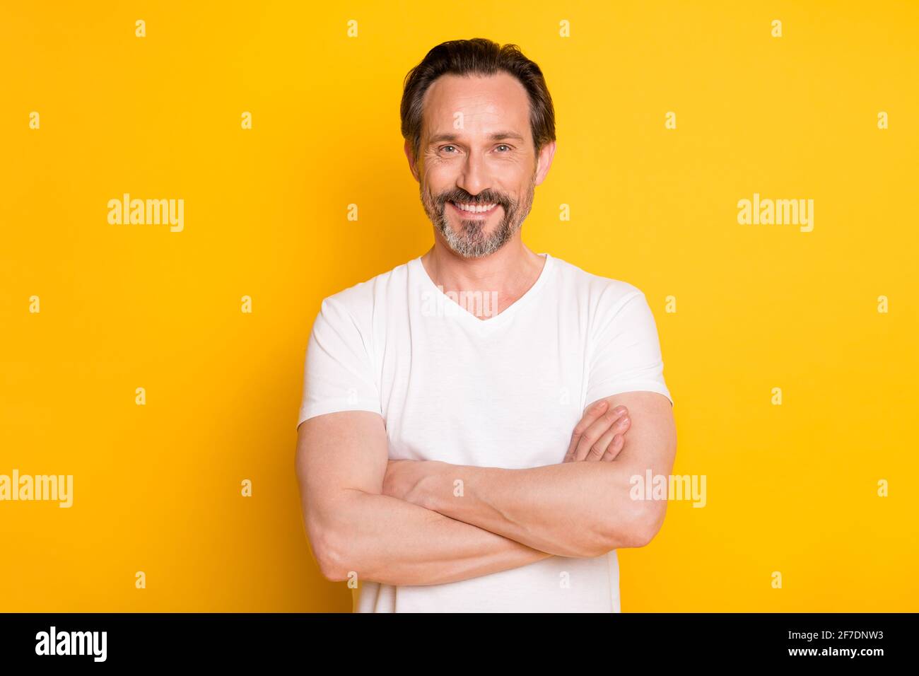 Photo of confident bearded man crossed arms toothy beaming smile wear ...