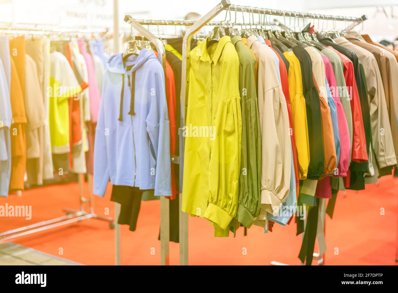 spring and summer women's clothing in the store. bright, modern clothes ...