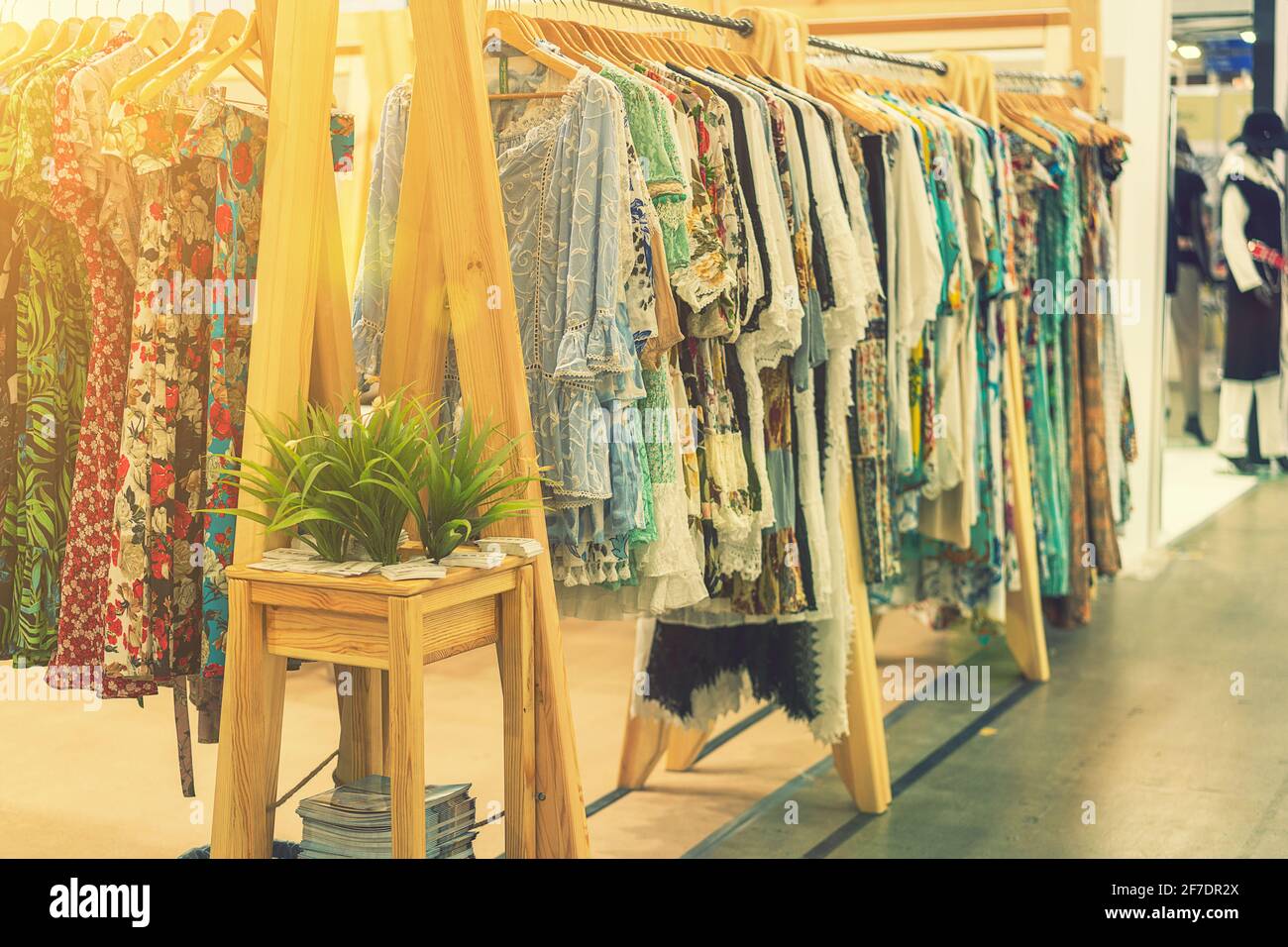 spring and summer women's clothing in the store. bright, modern clothes ...