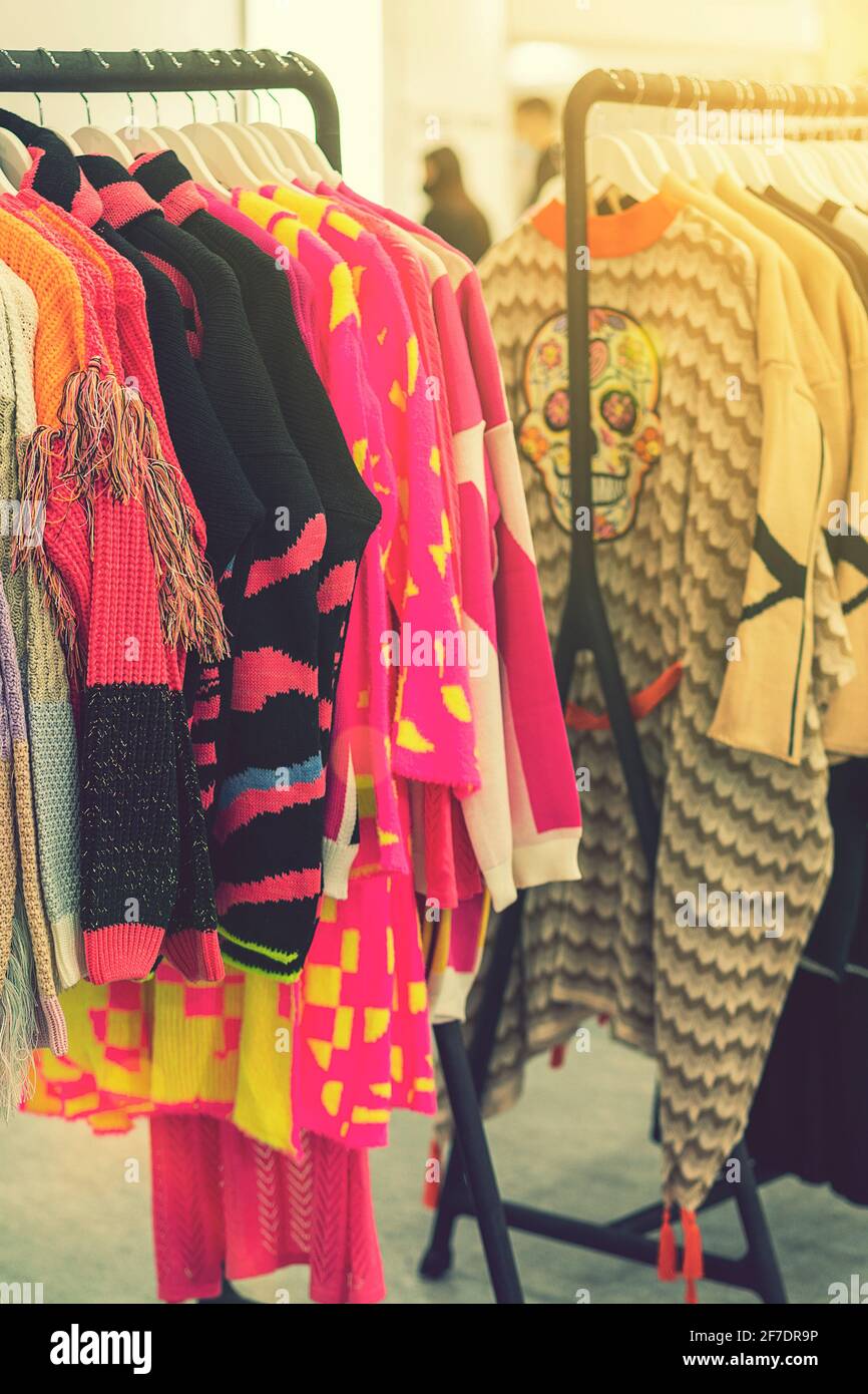 spring and summer women's clothing in the store. bright, modern clothes ...