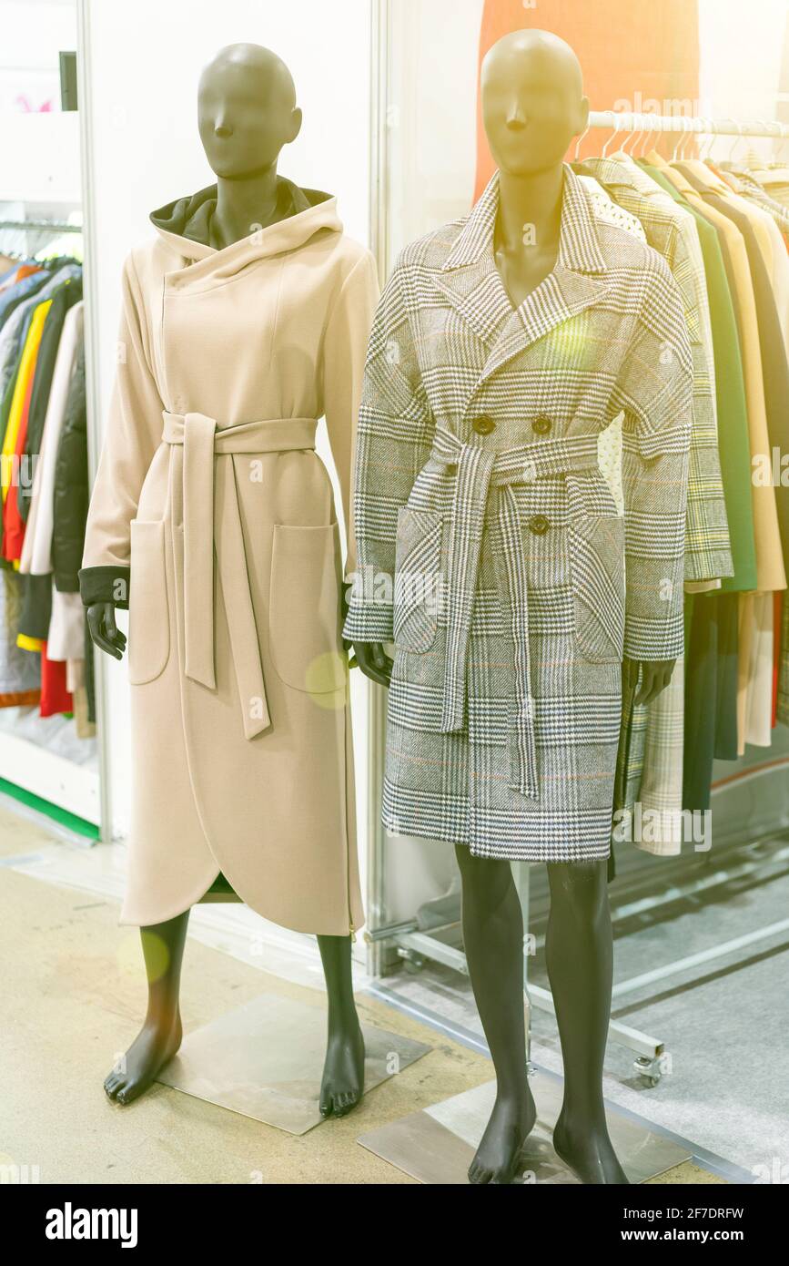 spring and summer women's clothing in the store. bright, modern clothes ...