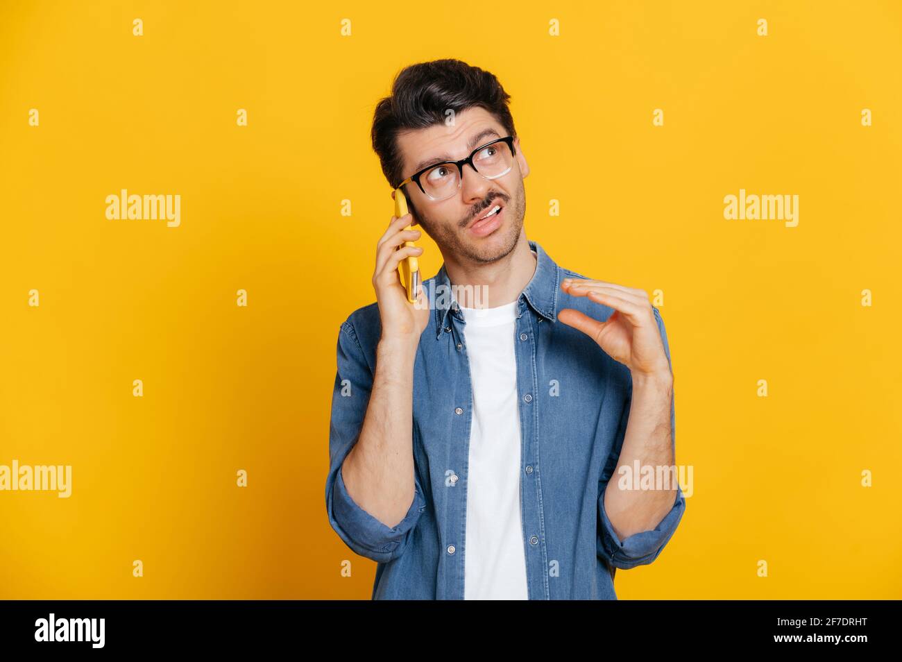 Phone call by cellphone. Attractive charismatic stylish guy has an ...