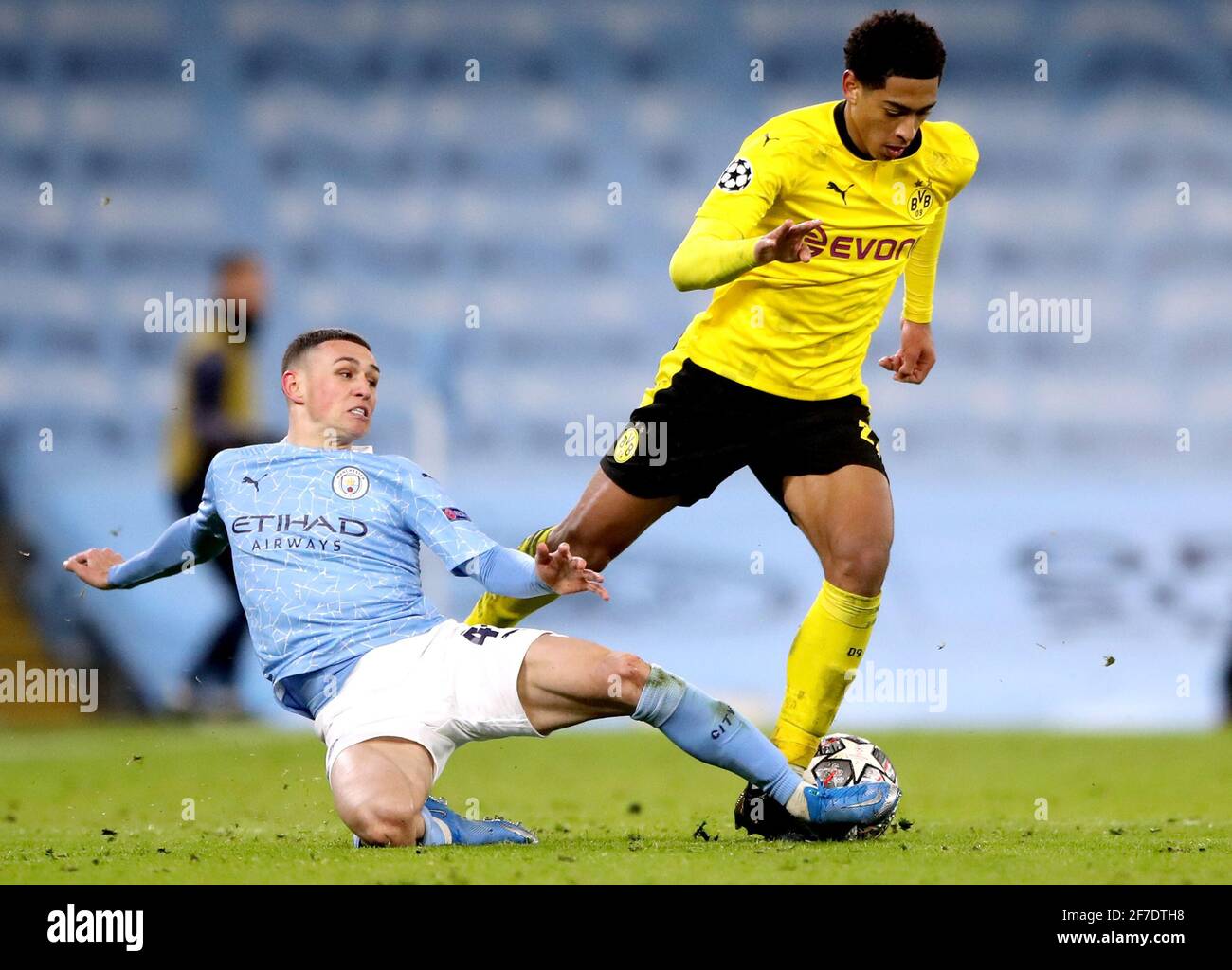 Manchester City's Phil Foden (left) tackles Borussia Dortmund's Jude ...