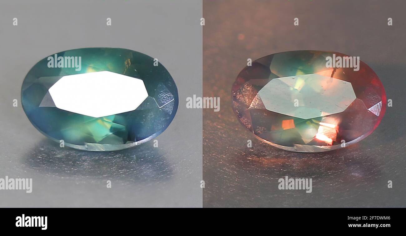 Natural gemstone alexandrite with color change on gray background Stock ...