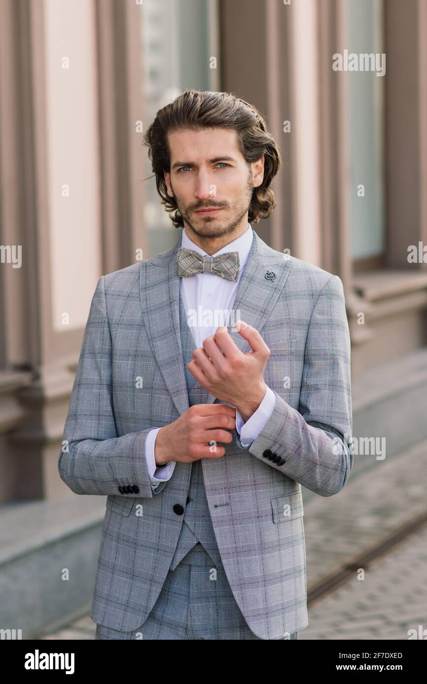 Stylish handsome man with beard, wearing suit jacket and shirt ...