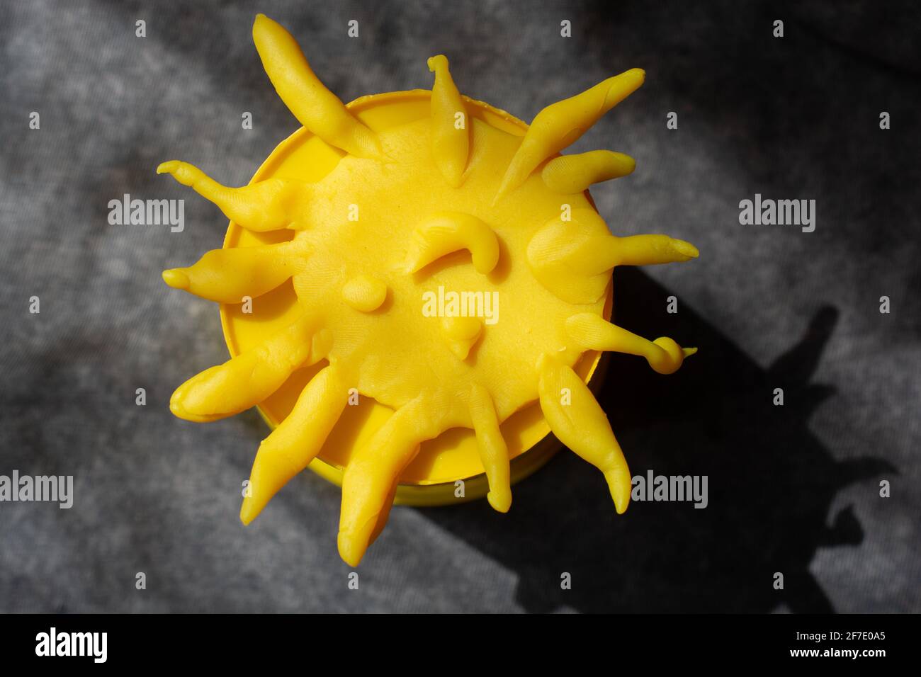 the yellow sun made by plasticine Stock Photo - Alamy