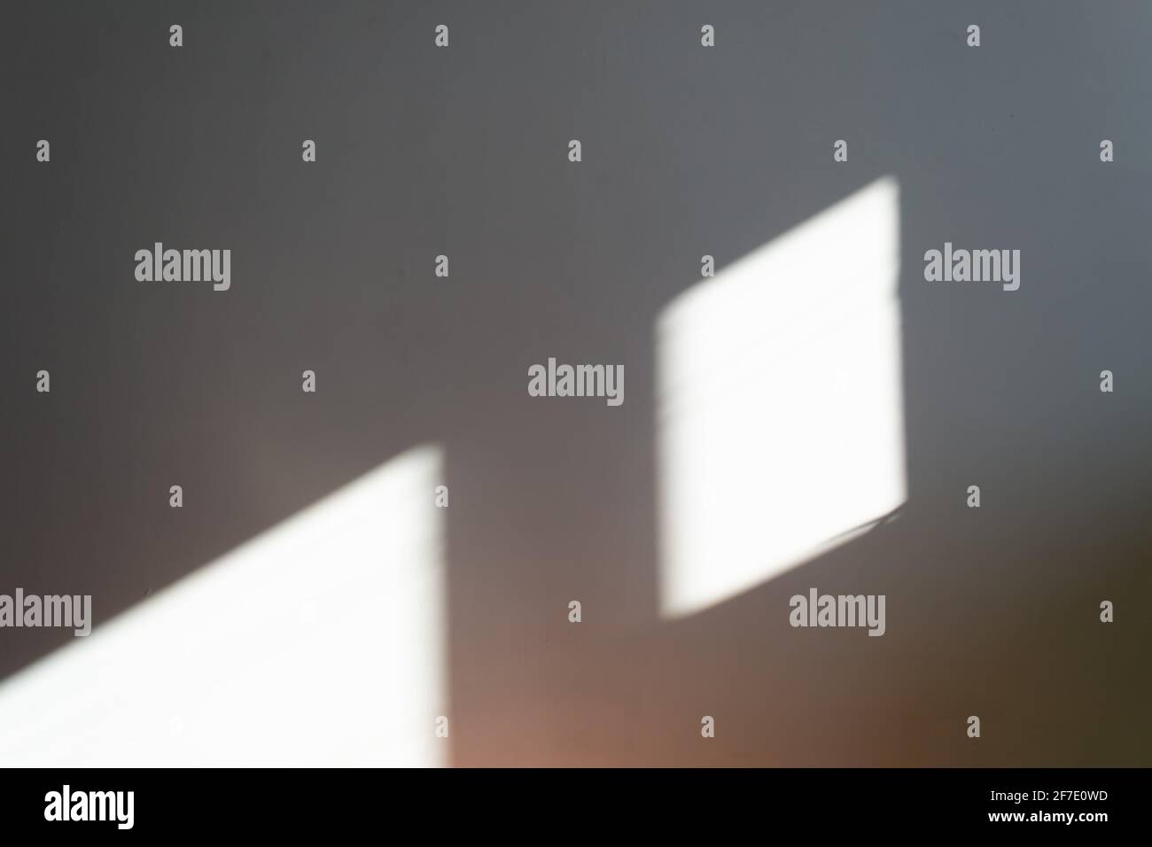 The shadow on the wall from the sun. The sun casts a shadow on a ...