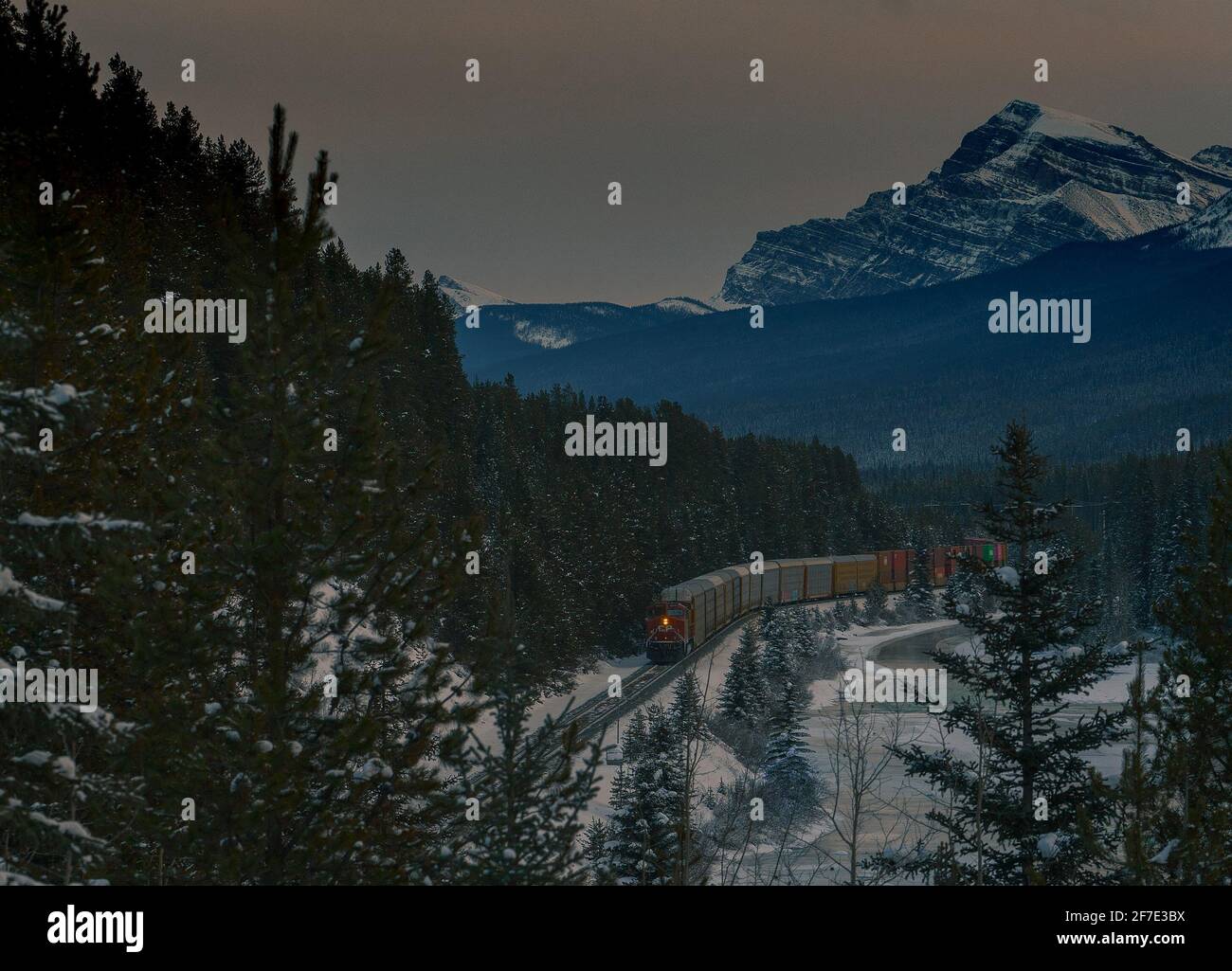 Freight train with containers after picturesque Morant's curve on a ...