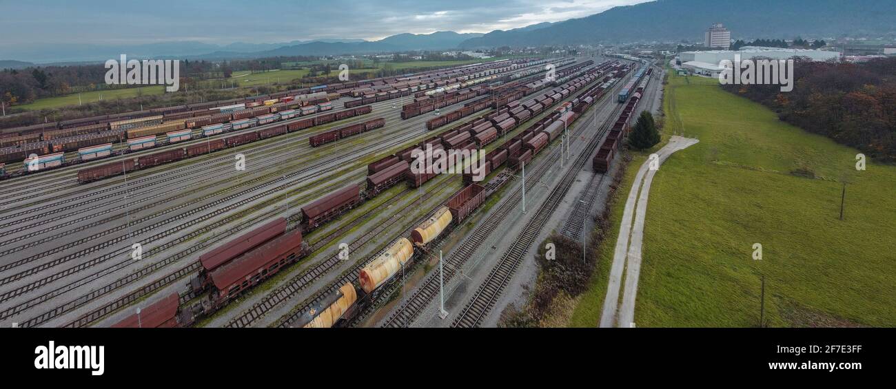 Train marshalling yard seen from above. A lot of tracks filled with ...