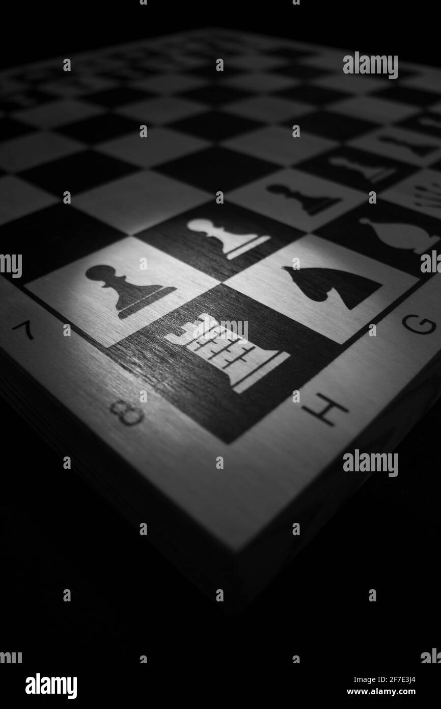 illuminated checkerboard corner on a black background Stock Photo - Alamy