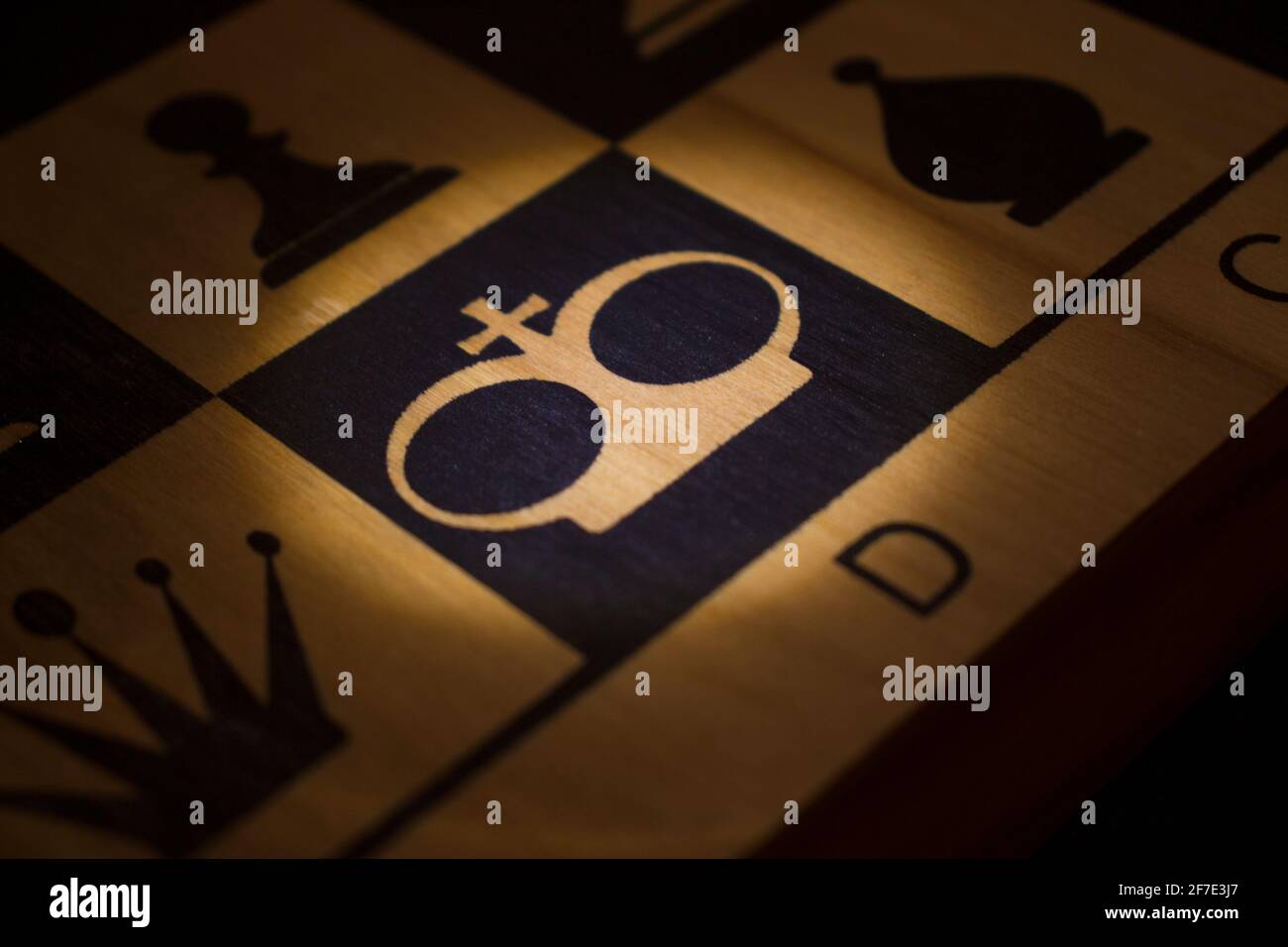 illuminated square with a picture of a king on a chessboard Stock Photo ...