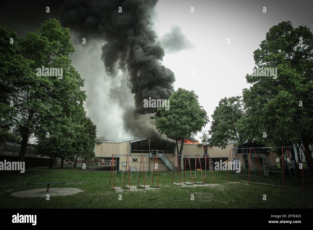 Firemen trying to extinguish a garage fire in Ljubljana, Slovenia ...