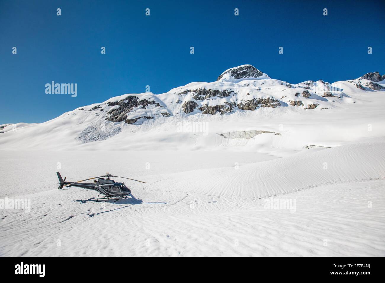 Helicopter landed on glacier during tour in British Columbia, Canada ...