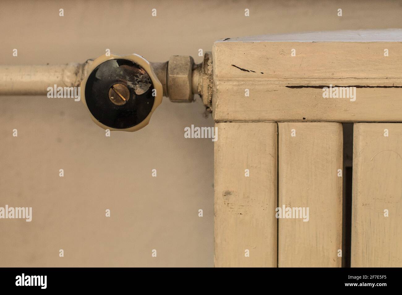 Old radiator heater valve and knob. Side view Stock Photo - Alamy