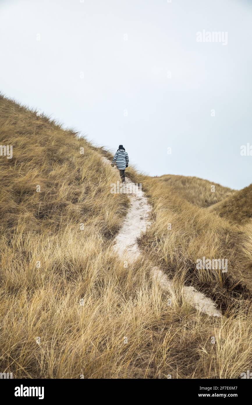 Strong wind blowing woman hi-res stock photography and images - Alamy