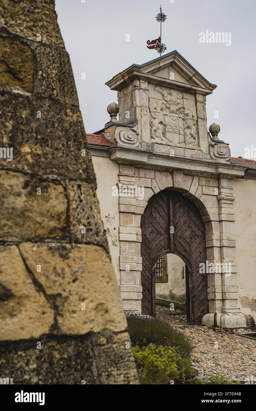 Main entrance gate of Ptuj castle or ptujski grad on a grey but ...