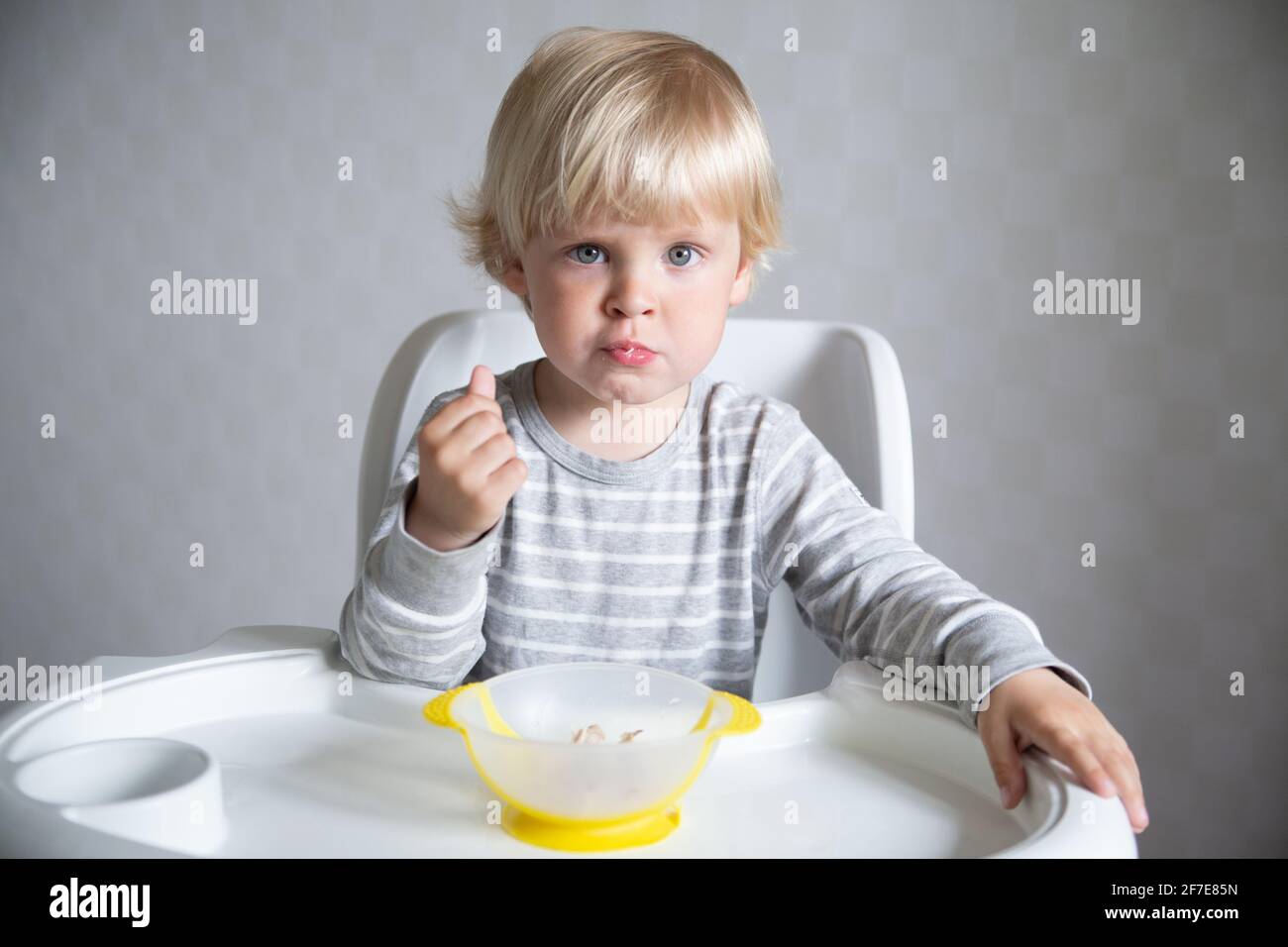 Child happy eating plate hi-res stock photography and images - Alamy