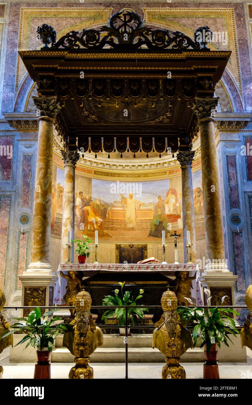 Altarpiece, interior of San Nicola in Carcere medieval catholic church ...